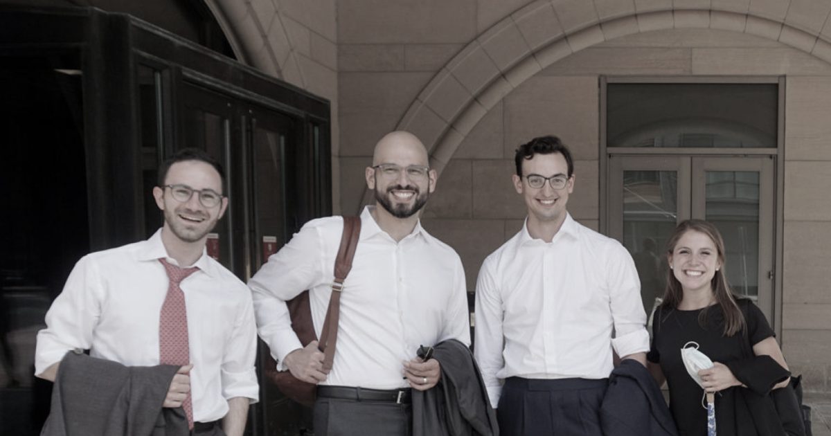 Executive Faculty Director Andrew Crespo works with students to ...